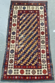 rugrabbit.com | Antique Rugs and Carpets | Asian Art | Tribal Art