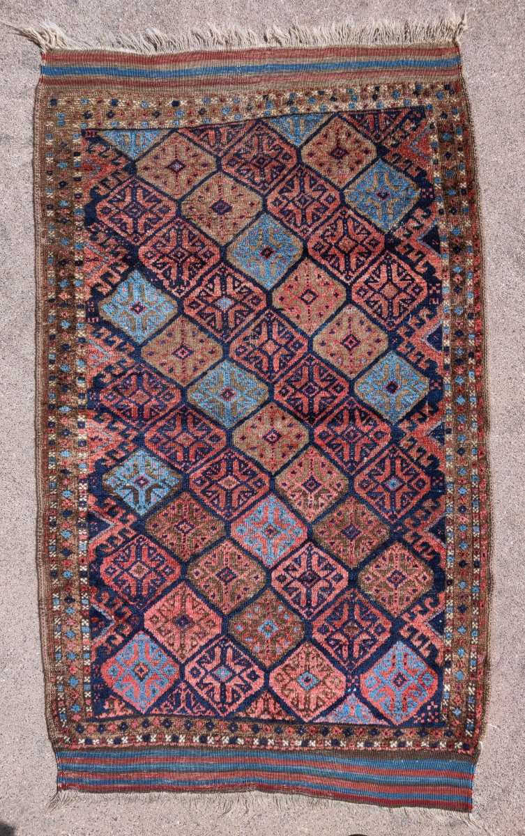 Arab Baluch rug with very glossy wool and several blues | rugrabbit.com