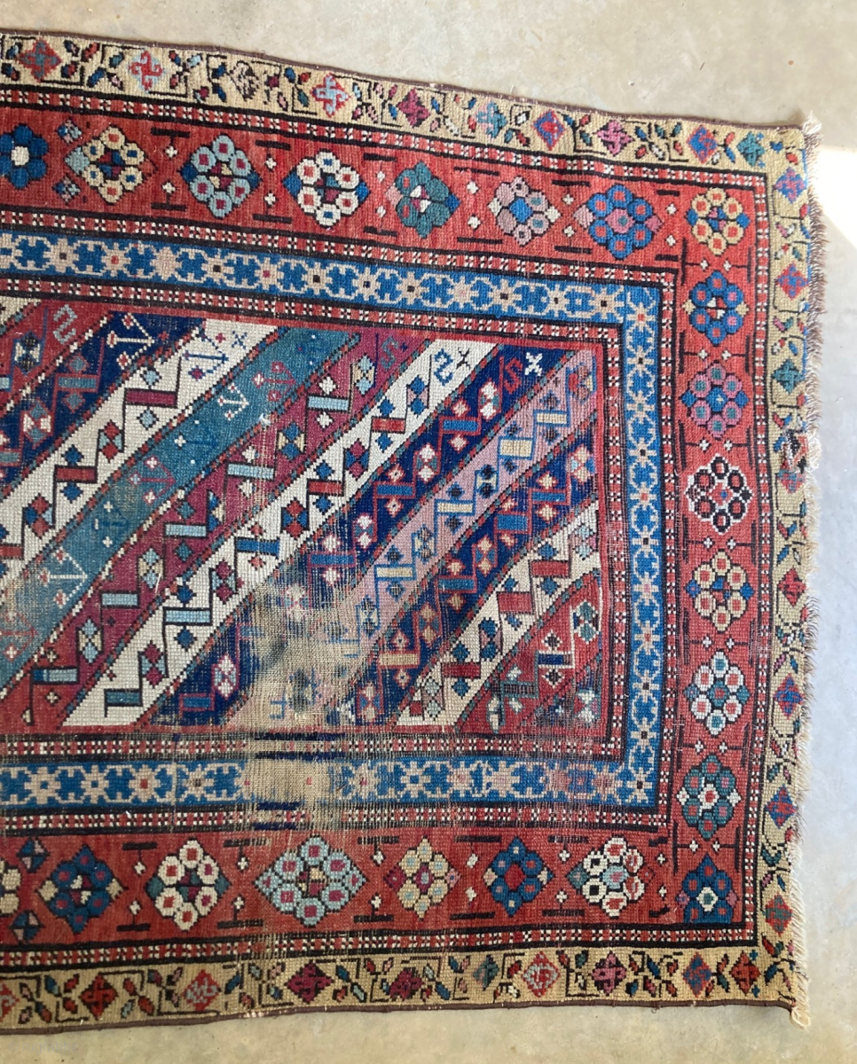 Antique Caucasian Gendje 3'5" x 8'10". Obvious wear and old repairs but ...